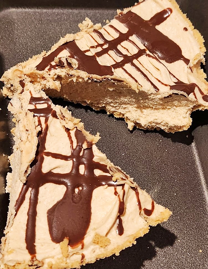 This peanut butter pie isn't just dessert&mdash;it's the grand finale. That chocolate drizzle is performing a victory dance across creamy peanut butter heaven.