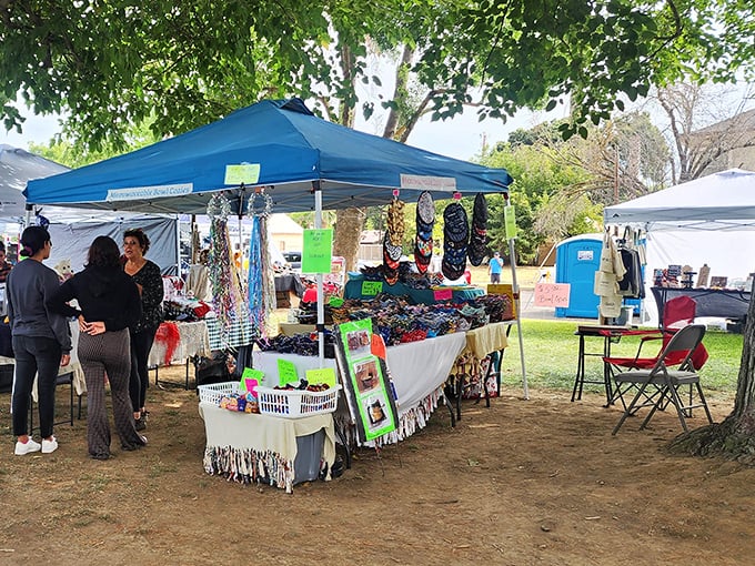 Newman's local markets bring the community together under shady trees, where colorful crafts and friendly faces create the town's vibrant social fabric.