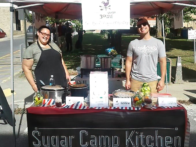 At the local farmers market, Sugar Camp Kitchen serves up smiles alongside homemade delights, proving farm-to-table isn't just a big city concept.
