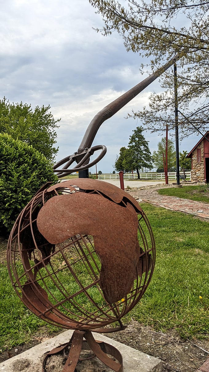 A rusted globe sculpture provides perfect perspective, as if suggesting this pitchfork could indeed move the world.