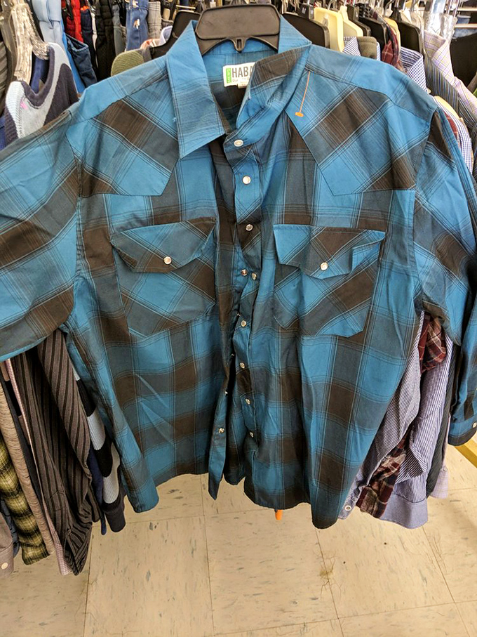This blue plaid western shirt practically comes with its own soundtrack of Willie Nelson classics and smell of campfire.