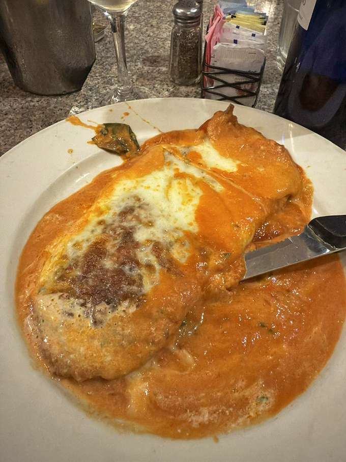 Chicken Parmigiana that doesn't just satisfy hunger&mdash;it creates memories, with cheese melted to perfection over a sea of vibrant sauce.