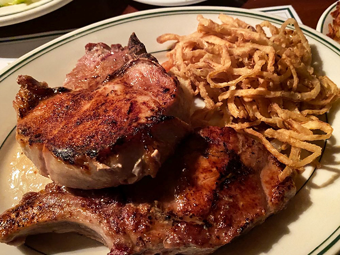 These pork chops aren't just cooked &ndash; they're transformed into a masterpiece of caramelized perfection that would make even vegetarians pause.
