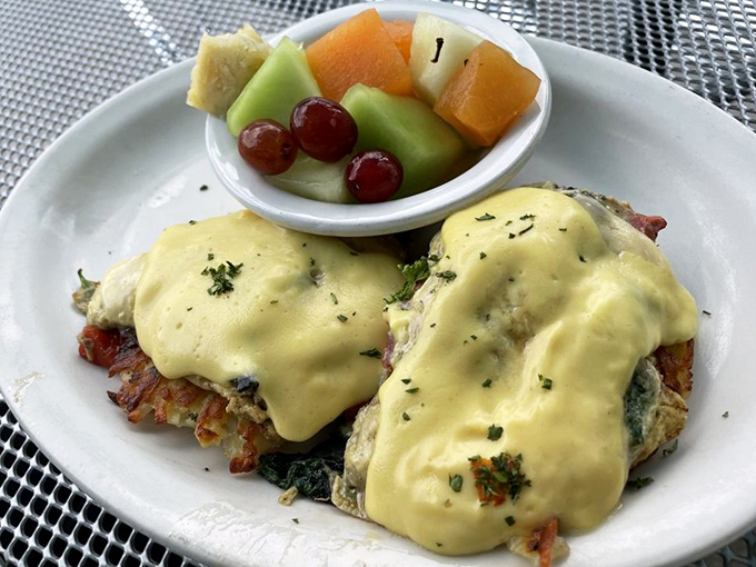 The Portabella Benedict brings unexpected sophistication to diner fare. Hollandaise sauce cascading over eggs like a yellow waterfall of happiness.