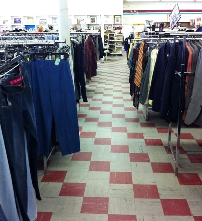 The red and white checkerboard floor guides shoppers through this labyrinth of previously-loved fashion finds.