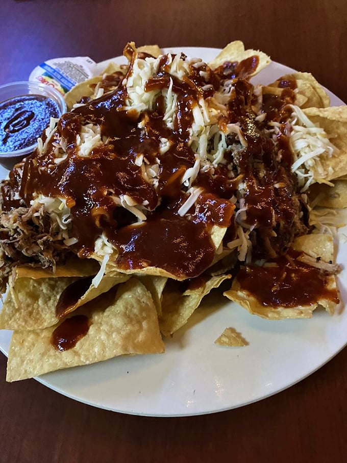 These pulled pork nachos aren't messing around&mdash;they're serious about that BBQ sauce relationship and they're not afraid to show it.