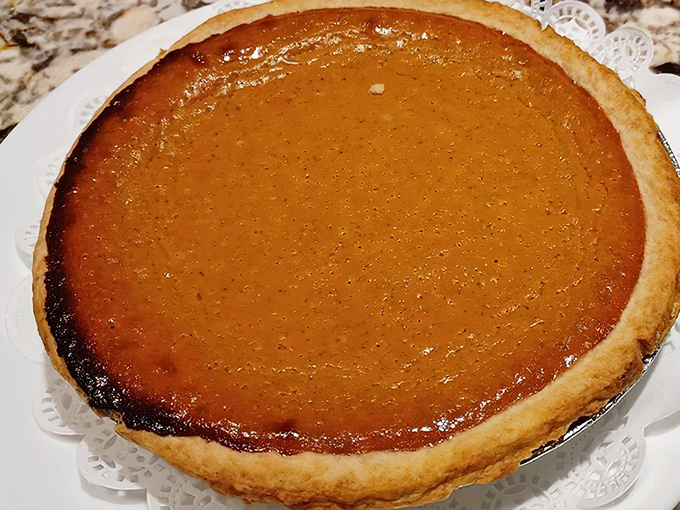 This pumpkin pie doesn't just say "fall"&mdash;it sings it in perfect harmony. The glistening surface promises spiced perfection in every bite.