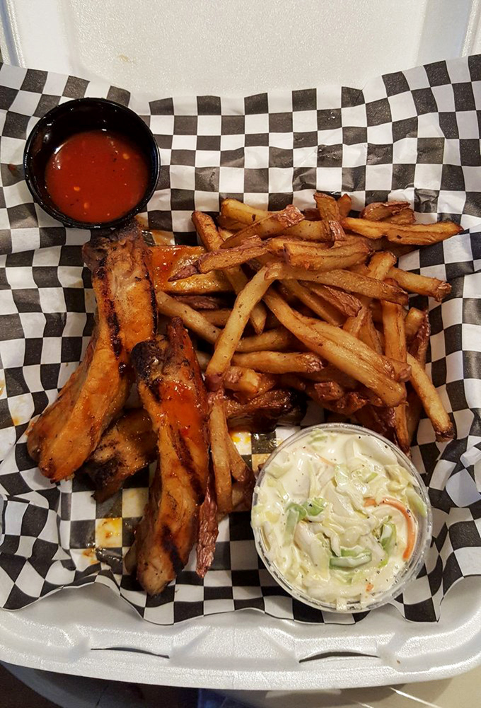 Barbecue ribs with the perfect bark, fries with attitude, and slaw that knows its supporting role&mdash;a trifecta of satisfaction.