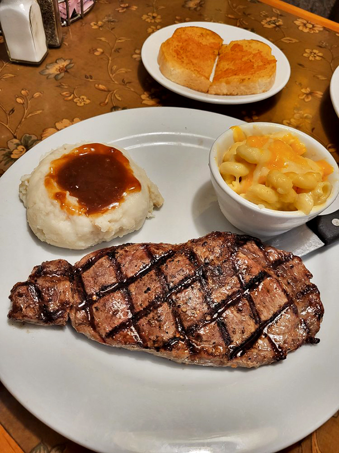 A perfectly grilled steak with classic sides proves that Kountry Folks isn't just a breakfast joint—it's an all-day affair for serious comfort food enthusiasts.