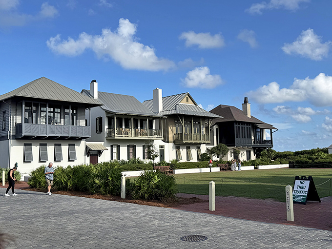 These beachfront homes stand like sentinels guarding the shoreline, their metal roofs gleaming in the Florida sunshine.