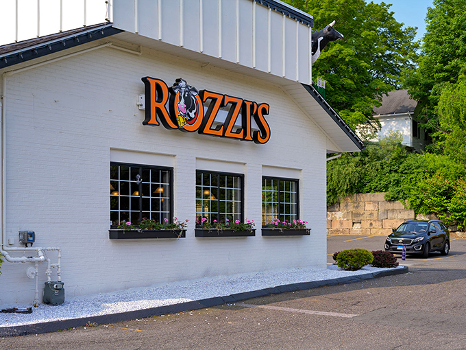 Rozzi's Restaurant's crisp white exterior and flower boxes promise comfort food that hugs your insides like your grandmother, but with better timing.