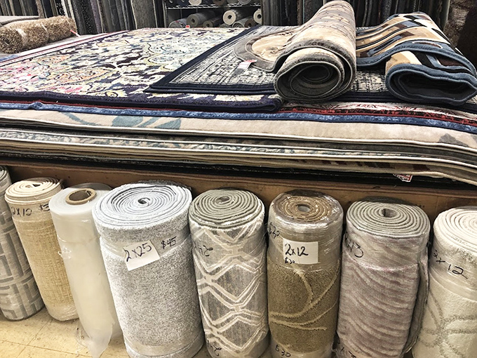 Floor art that ties the room together. These rolled treasures are just waiting to be unfurled in their forever homes.
