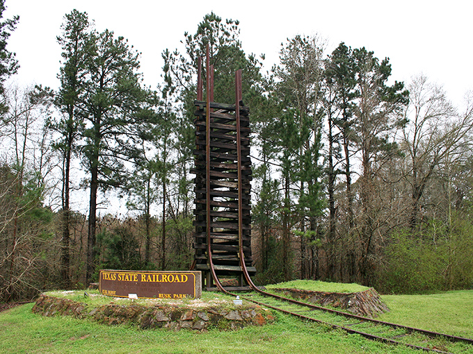 This wooden railroad monument stands tall among the pines, a creative tribute to the tracks that transformed East Texas.