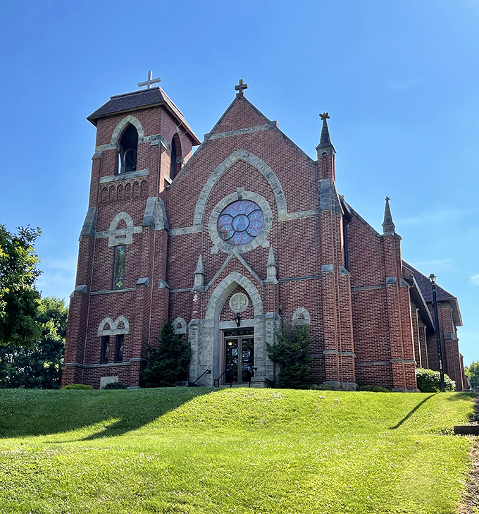 Sacred Heart Catholic Church's magnificent brick architecture reaches skyward, a spiritual landmark that's been photogenic since long before selfies existed.