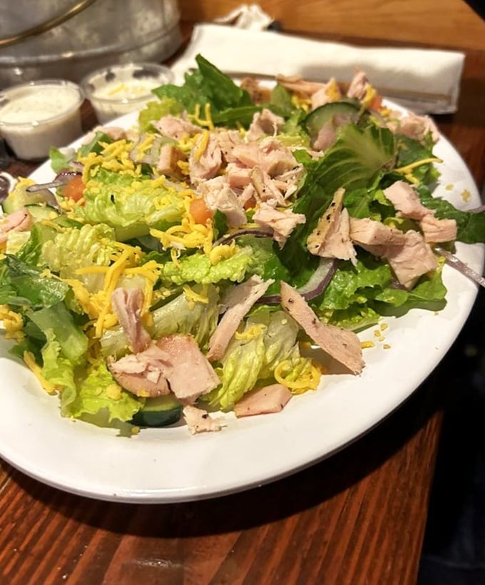 Even the salad gets the respect it deserves, with turkey that proves vegetables can have interesting friends too.