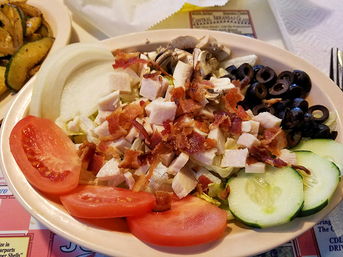 When a diner offers a proper salad, you know they understand balance&mdash;like how those bacon bits are technically a vegetable if you squint hard enough.