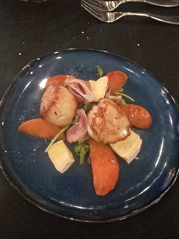 Scallops so perfectly seared they should give master classes. Paired with colorful companions that make the plate look like edible art.