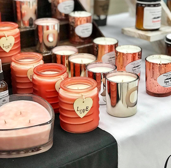 Candles that promise to make your home smell better than it actually is. That "Love" label knows exactly what you're feeling.