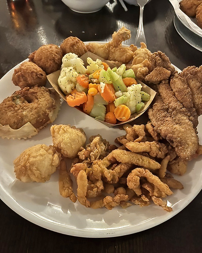 The seafood platter that answers the eternal question: "Why choose one when you can have it all?" Fried bounty from both land and sea. 