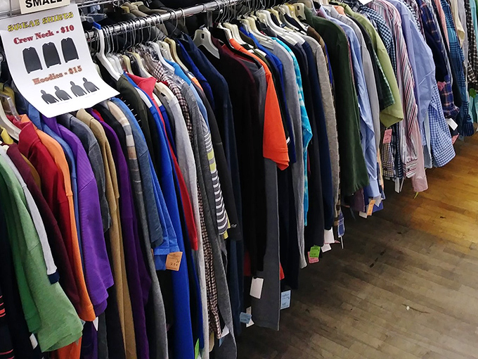 Organized by color and size, these shirt racks make finding your perfect secondhand wardrobe staple surprisingly simple and satisfying.