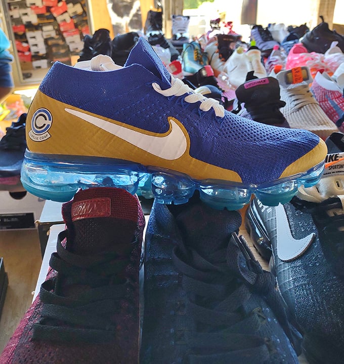 These blue and gold athletic shoes aren't just footwear—they're someone's team spirit waiting to hit the pavement or the bleachers.