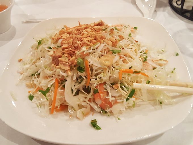 A mountain of freshness: crisp vegetables, herbs, and crushed peanuts create a salad that's as beautiful to look at as it is delightful to eat.