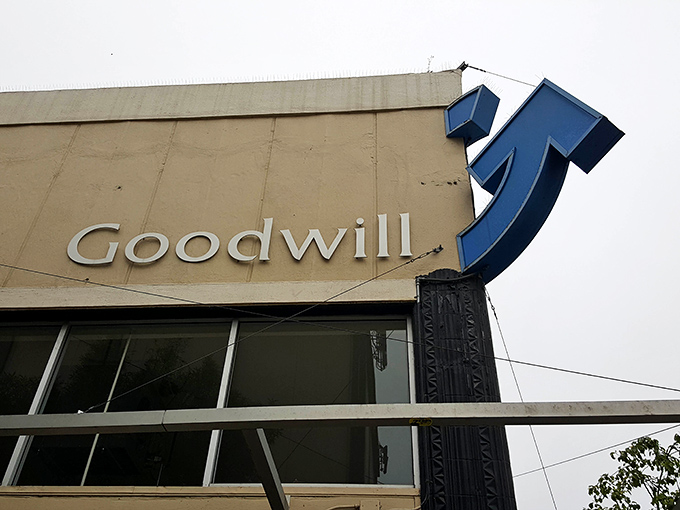 The iconic Goodwill smile logo reminds shoppers that their purchases support job training programs&mdash;retail therapy that actually provides therapy to others.