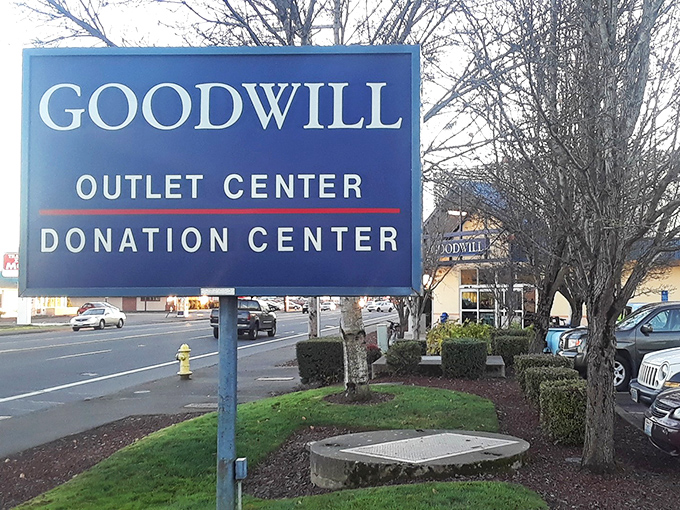 The roadside beacon that guides bargain hunters to their happy place. Both "Outlet" and "Donation" on one sign&mdash;the perfect circle of sustainable shopping.