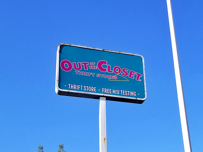 The roadside sign announces the dual mission with pride: fabulous finds and free health services under one colorful roof.