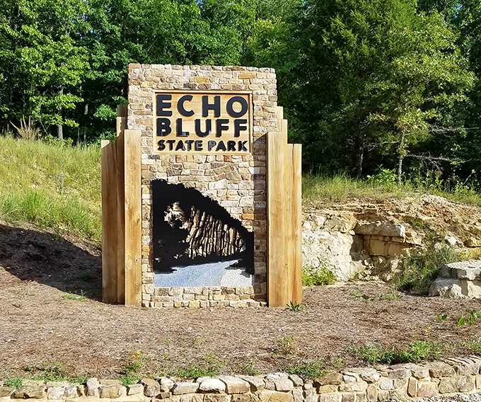The park entrance sign offers a stone-framed preview of the natural wonders waiting just beyond&mdash;like a trailer for Earth's greatest hits.