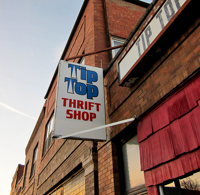 The perpendicular sign juts proudly from the building, a North Star for thrifters navigating Omaha's streets.