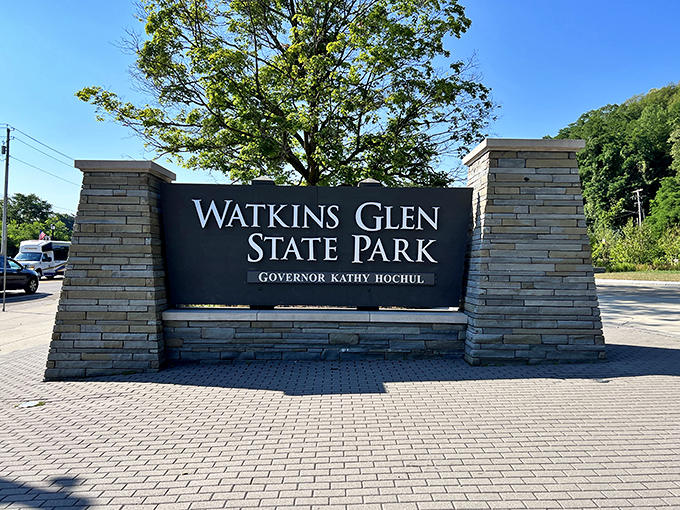 The park entrance sign promises adventure beyond its stone pillars. Like the doorway to Narnia, but with better trail maintenance.