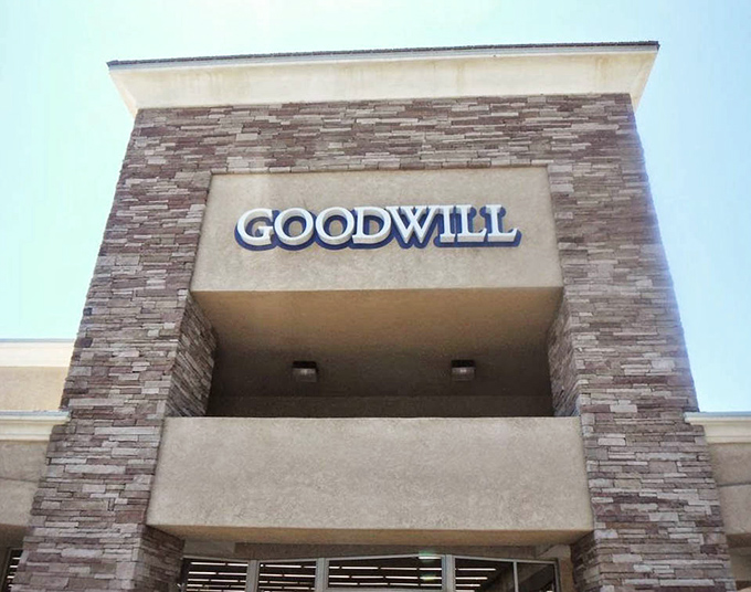 The Goodwill logo stands proud, a beacon of hope for both bargain hunters and those seeking to donate.