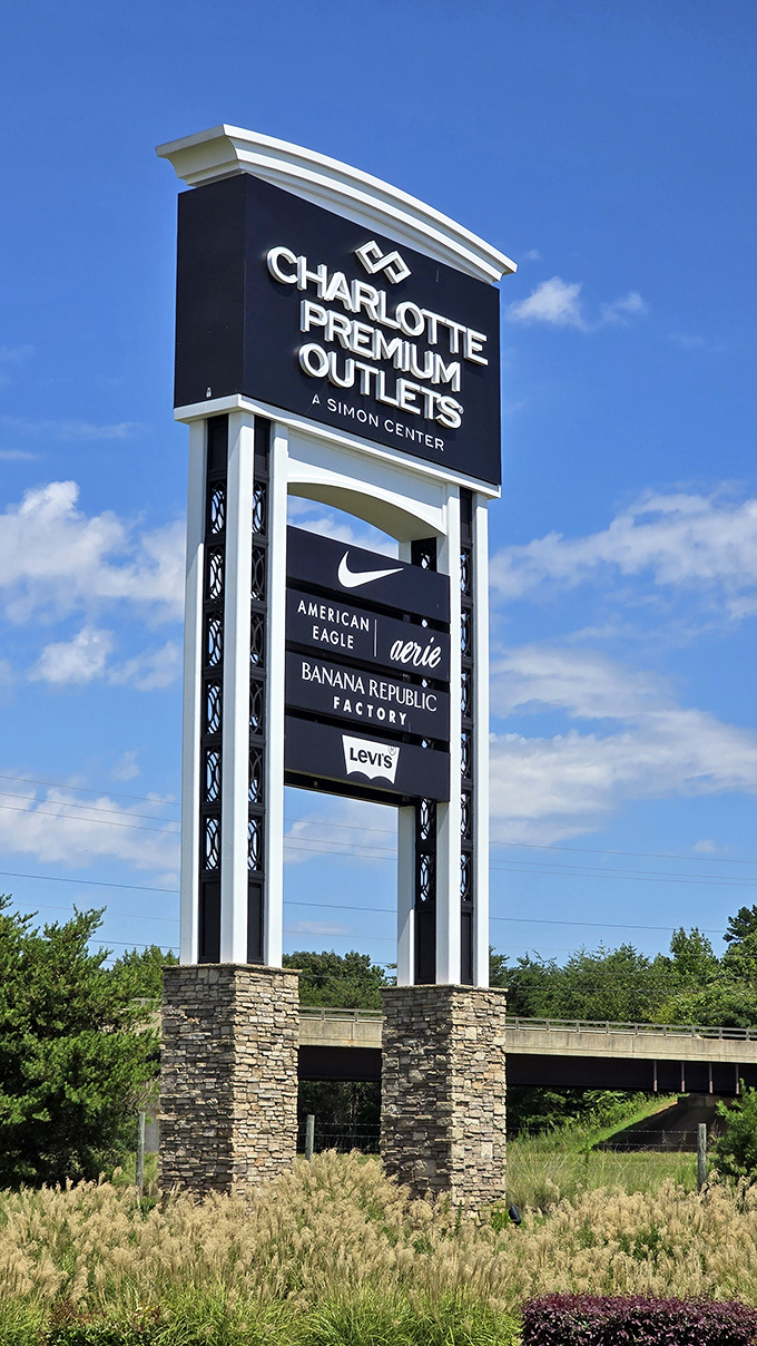 The towering sign that says "Yes, you've arrived at the promised land of discounts" before you've even parked your car.