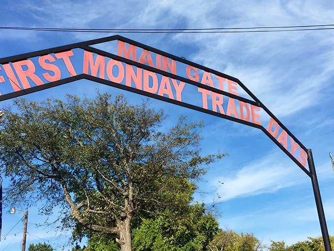 The Main Gate welcomes treasure hunters against a perfect Texas sky. Your adventure begins here—wallet beware!