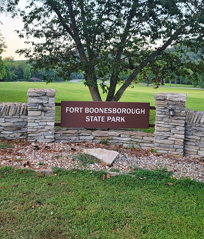The entrance sign nestled in Kentucky stonework announces your arrival to frontier paradise. History has never looked so inviting.