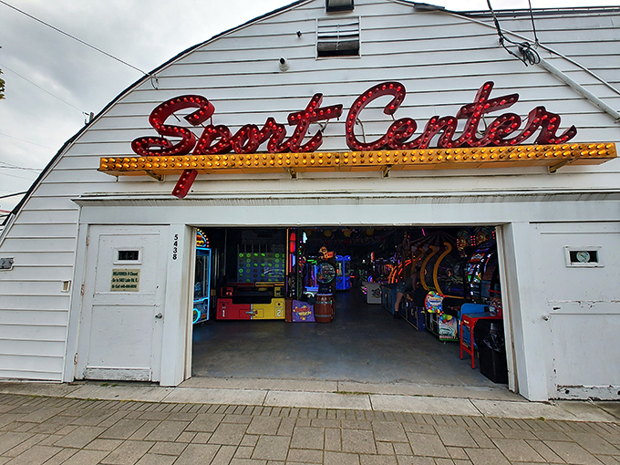 The Sport Center's vintage sign promises old-school entertainment without subscription fees. Pinball wizards and skee-ball champions are made, not born, under these lights.