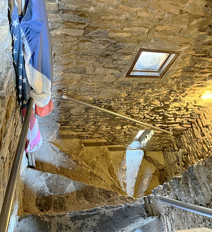 Narrow stone staircases wind through the castle interior, challenging modern visitors to imagine life before elevators and building codes.