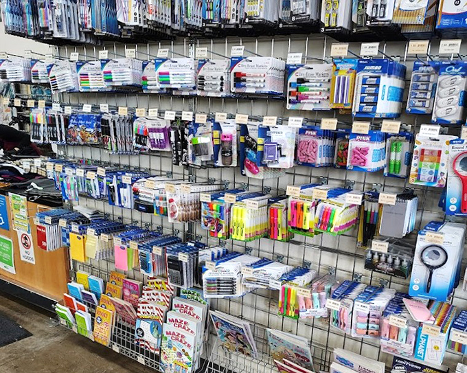 Office supply heaven! From markers to notebooks, this wall of organizational potential would make Marie Kondo weep with joy.