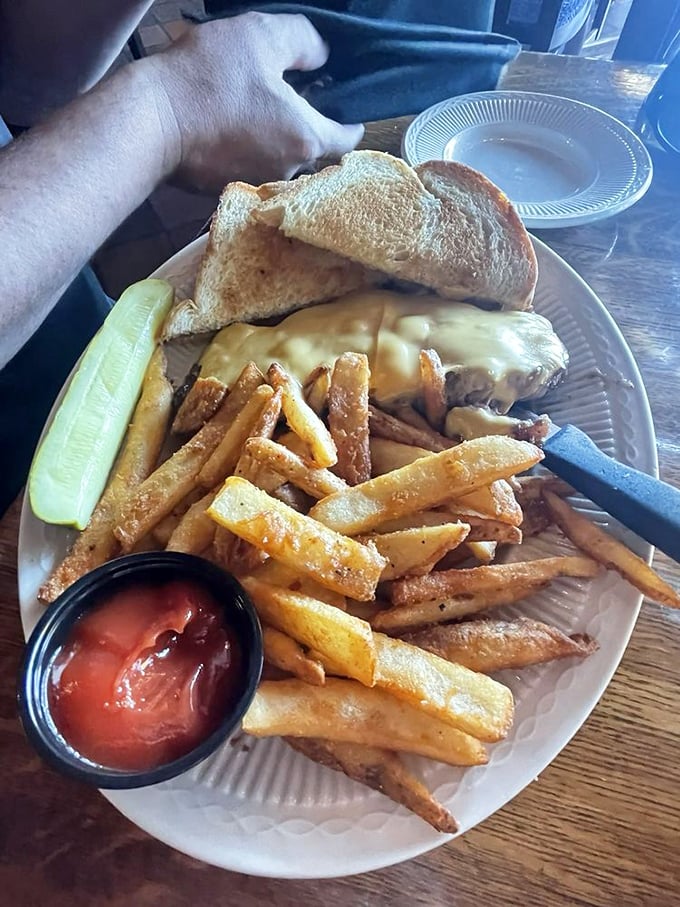 The steak sandwich&mdash;where prime beef meets melted cheese in a handheld masterpiece. Paired with fries so crisp they deserve their own sound effect.