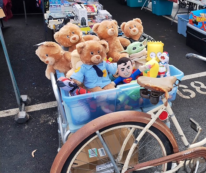 Teddy bears having the ride of their lives! These plush passengers are just waiting for someone to take them home from their carnival adventure.