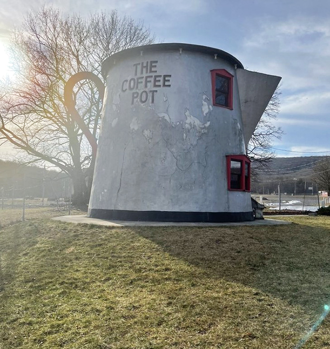 Morning light bathes the Coffee Pot in a golden glow. Even roadside kitsch looks magical at the right time of day.