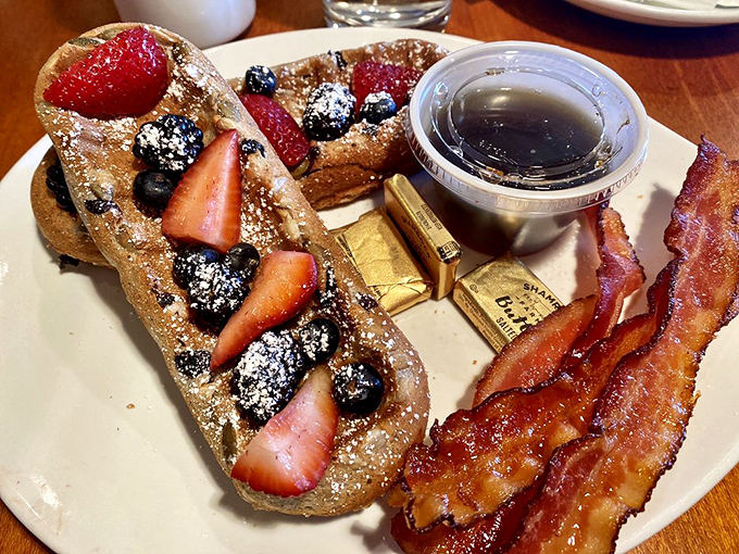 These aren't your ordinary waffles&mdash;they're superfood canvases painted with berries, dusted with powdered sugar, and accompanied by bacon because balance.