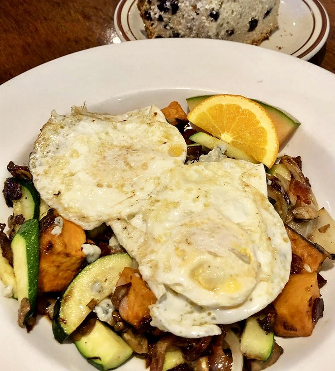 Sweet potato hash crowned with perfectly fried eggs proves that breakfast is the meal most deserving of a royal title.