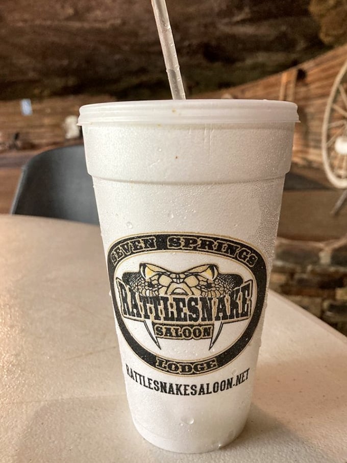 The logo-emblazoned cup isn't just holding sweet tea&mdash;it's containing liquid Southern hospitality that somehow tastes better when sipped beneath ancient stone.