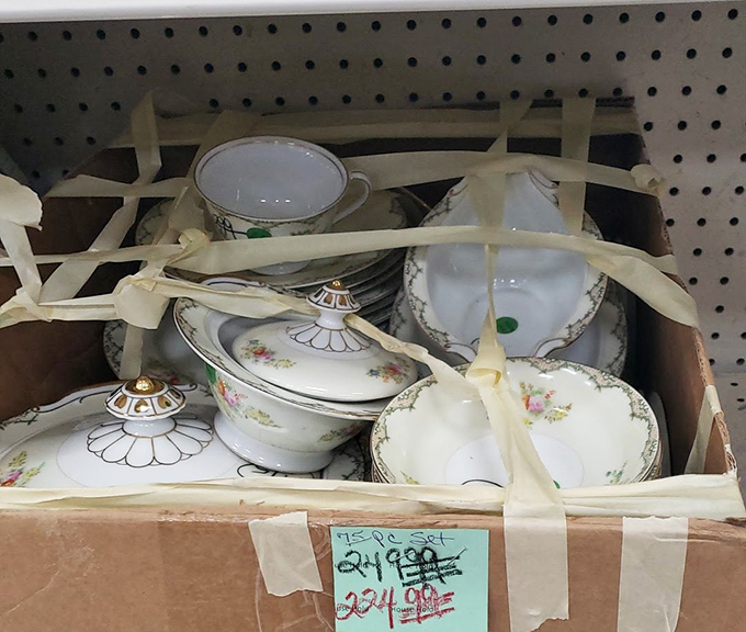 Delicate china, carefully secured for its next adventure. Someone's wedding registry castoffs become your sophisticated dinner party upgrade.