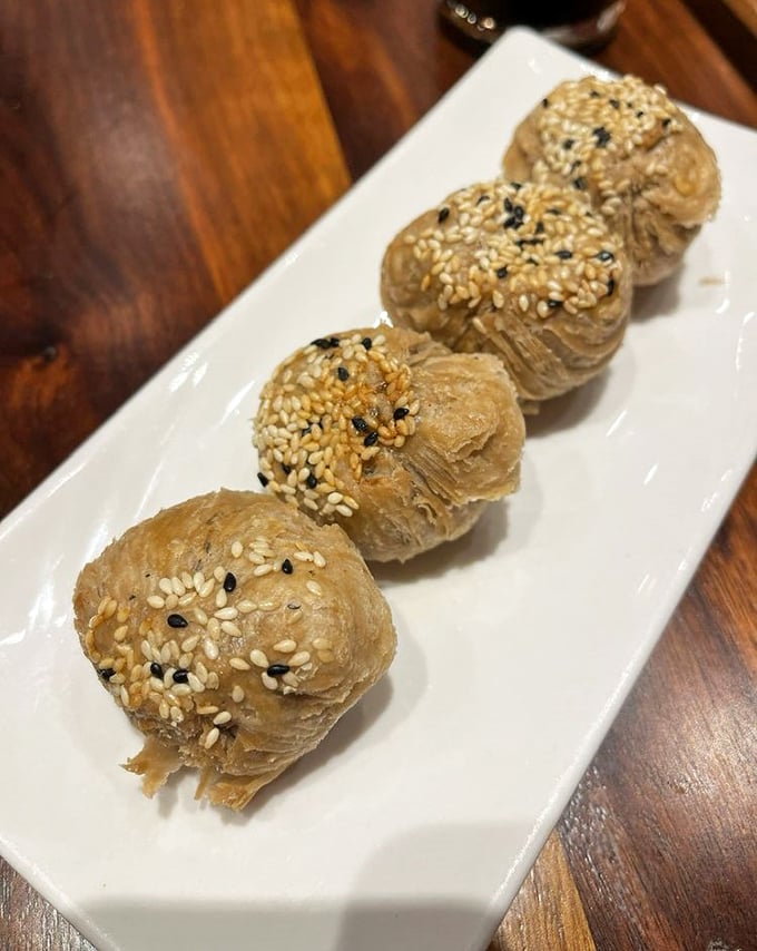 These golden sesame balls aren't just dessert, they're edible treasure chests hiding sweet surprises within their chewy exterior.