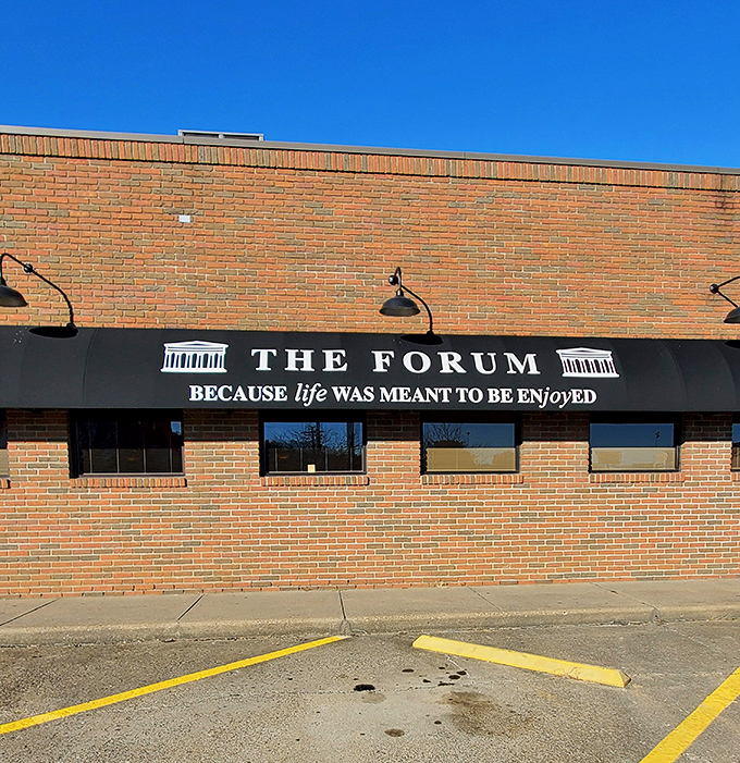 The Forum celebrates life's simple pleasures with its welcoming facade. Their philosophy is right there on the sign&mdash;life was indeed meant to be enjoyed.