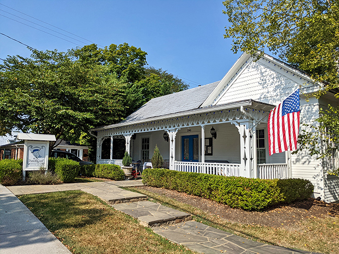 This charming cottage with its American flag proudly displayed embodies the welcoming spirit that makes Lewisburg feel instantly like home.
