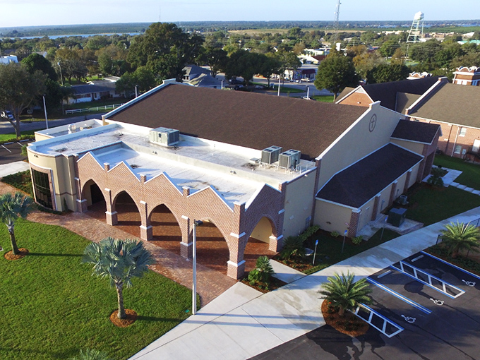 This church's architecture blends Florida practicality with spiritual aspiration, a community anchor visible from across town.